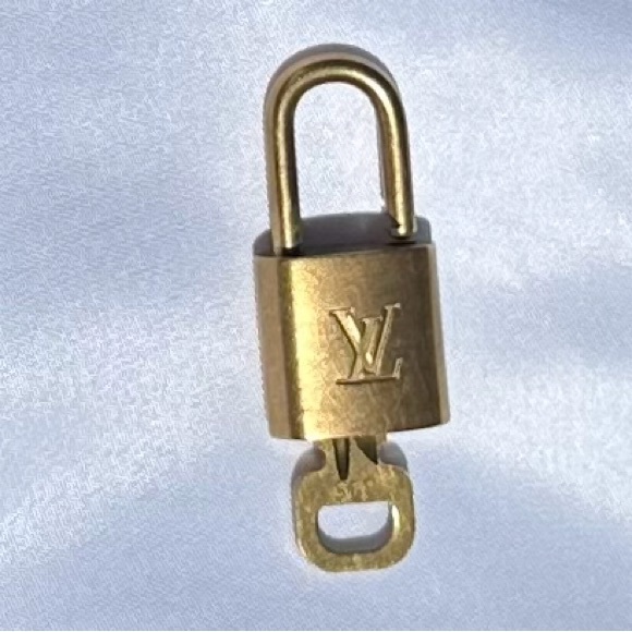 Louis Vuitton | Other | Louis Vuitton Gold Padlock | Poshmark